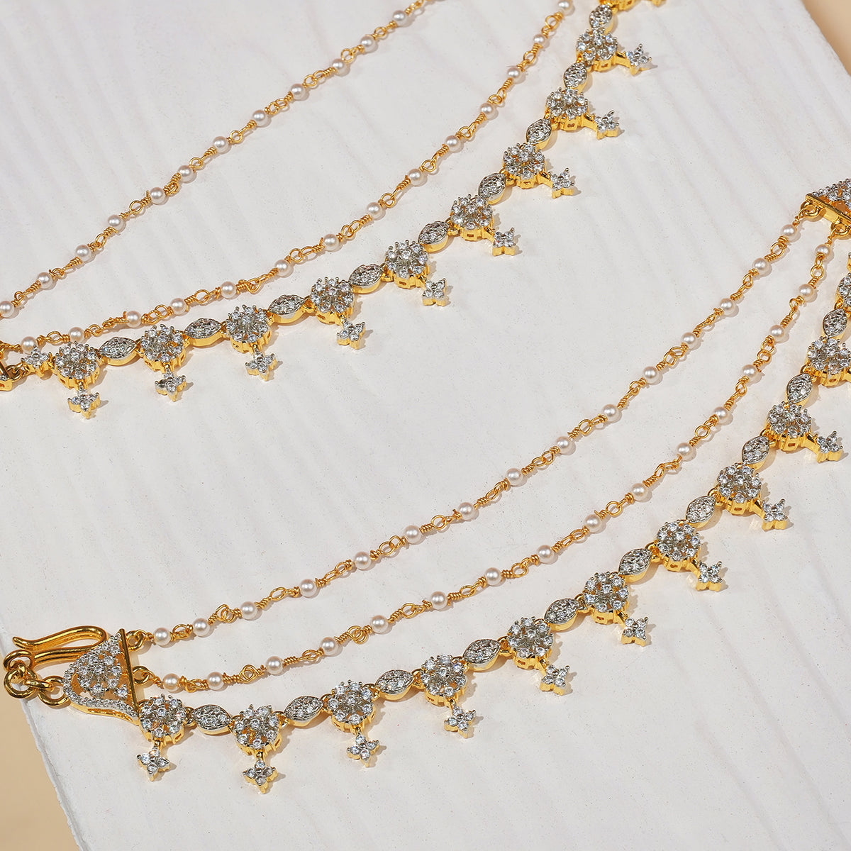 Silver and CZ Champaswaraalu with Floral Design – Padmam